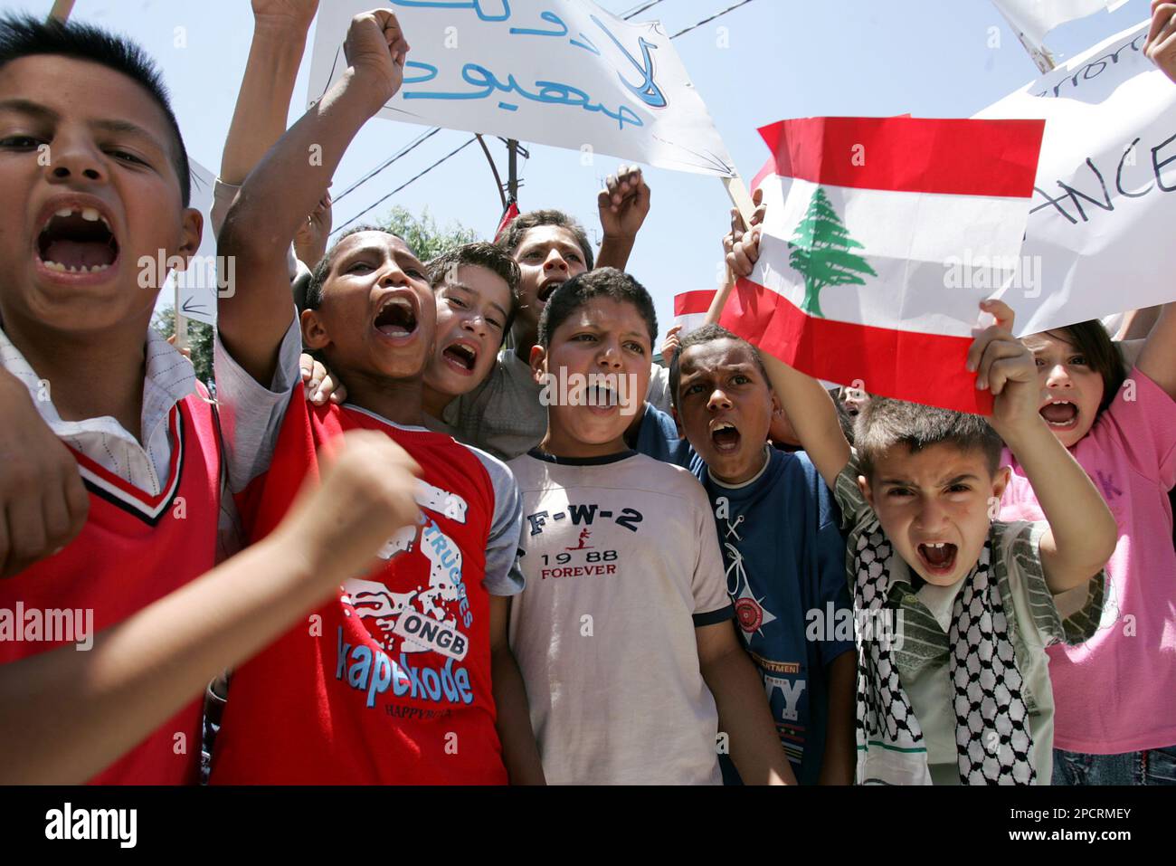 Jordanian children shout anti-Israeli slogans and wave replica Lebanese ...