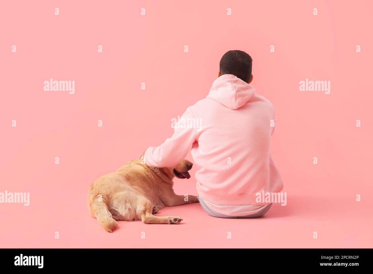 Back view of man and doggy hi-res stock photography and images - Alamy