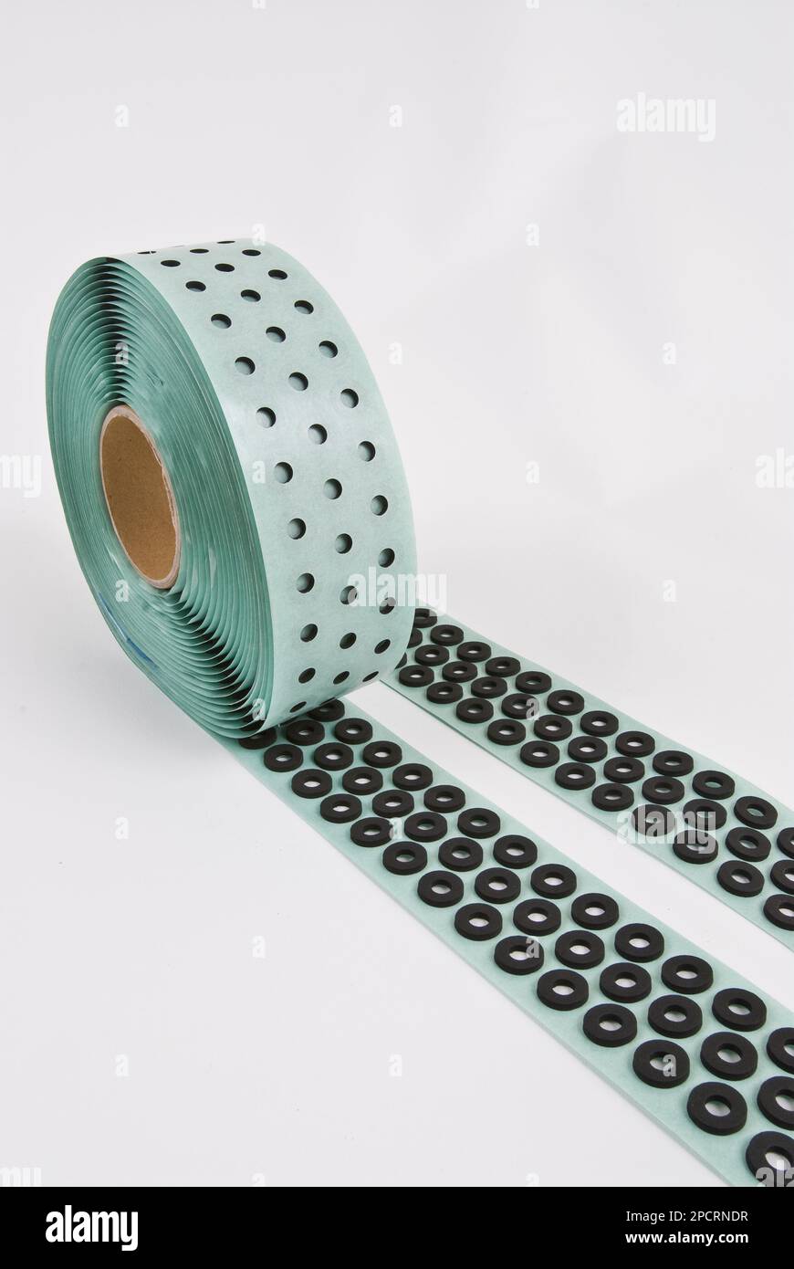 Roll of gray foam rubber sheet isolated in white. High quality photo ...