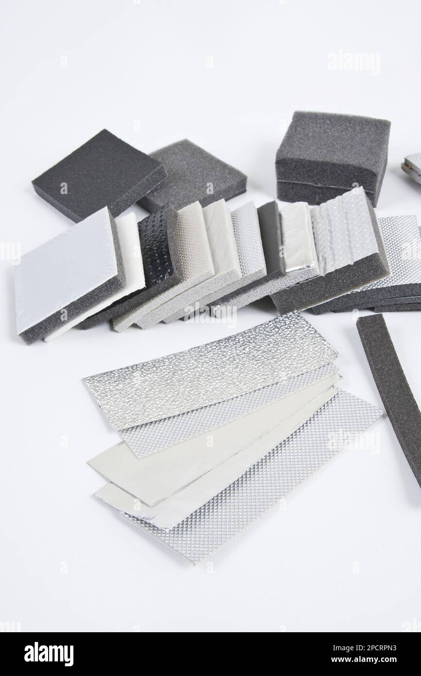 Roll of gray foam rubber sheet isolated in white. High quality photo ...
