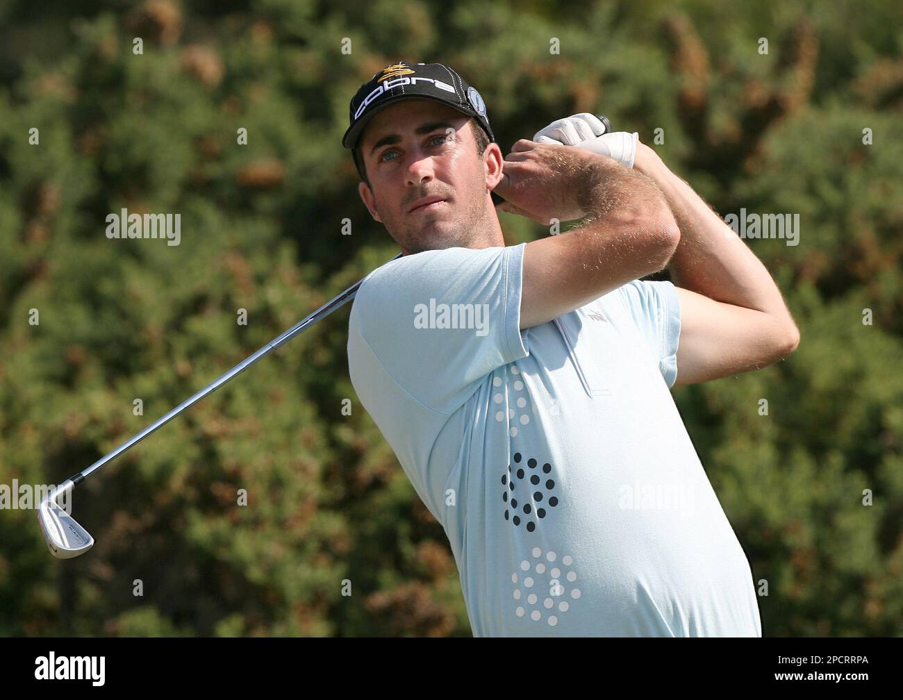 Australia's Geoff Ogilvy plays a tee shot during a practice round for ...
