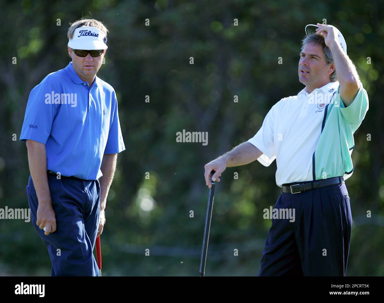 Fred Couples, right, and Davis Love III chat during a practice round for the upcoming British ...