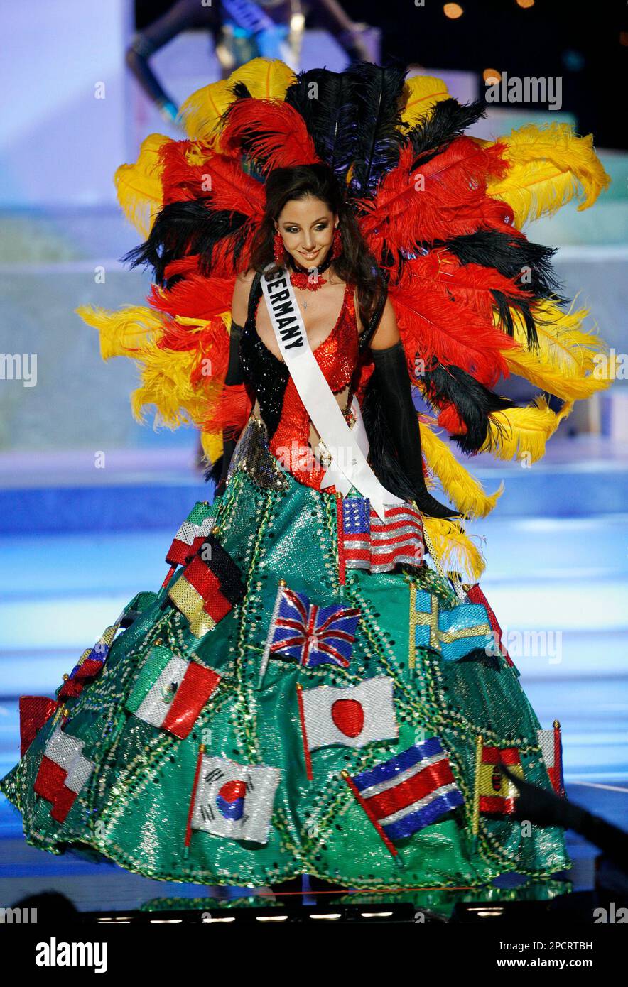 Miss Germany, Natalie Ackermann, shows off a costume related to her ...