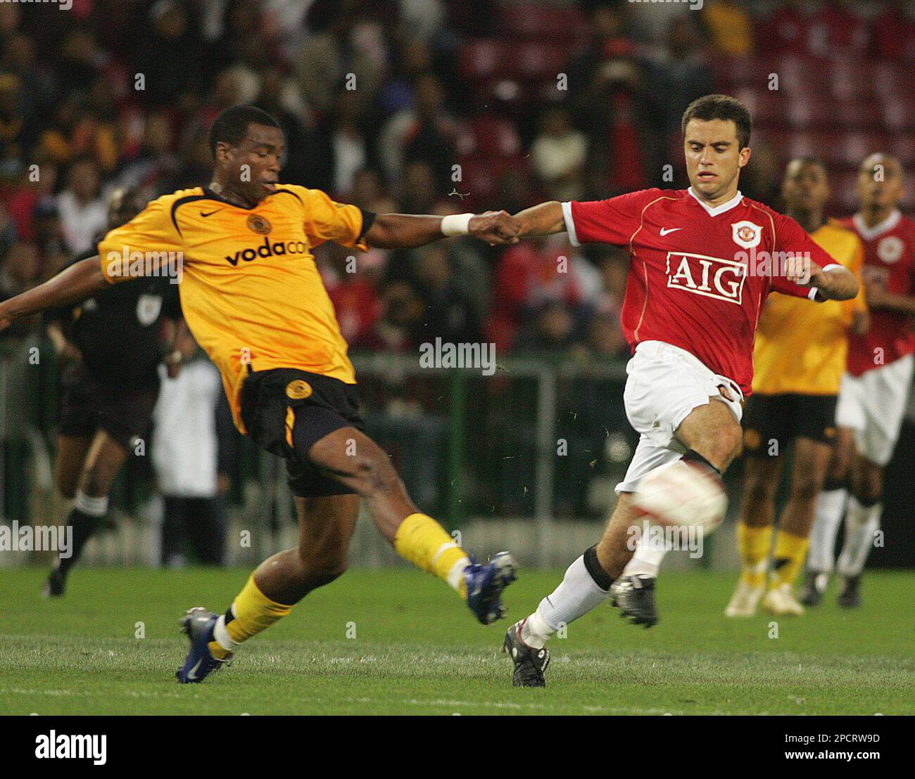 Manchester United striker Giuseppe Rossi, right, fends off Kaizer ...