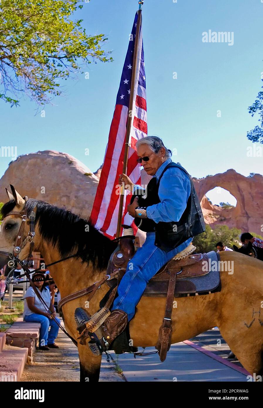 Council delegate Leslie Dele, of Tonalea, Ariz., bows his head during ...