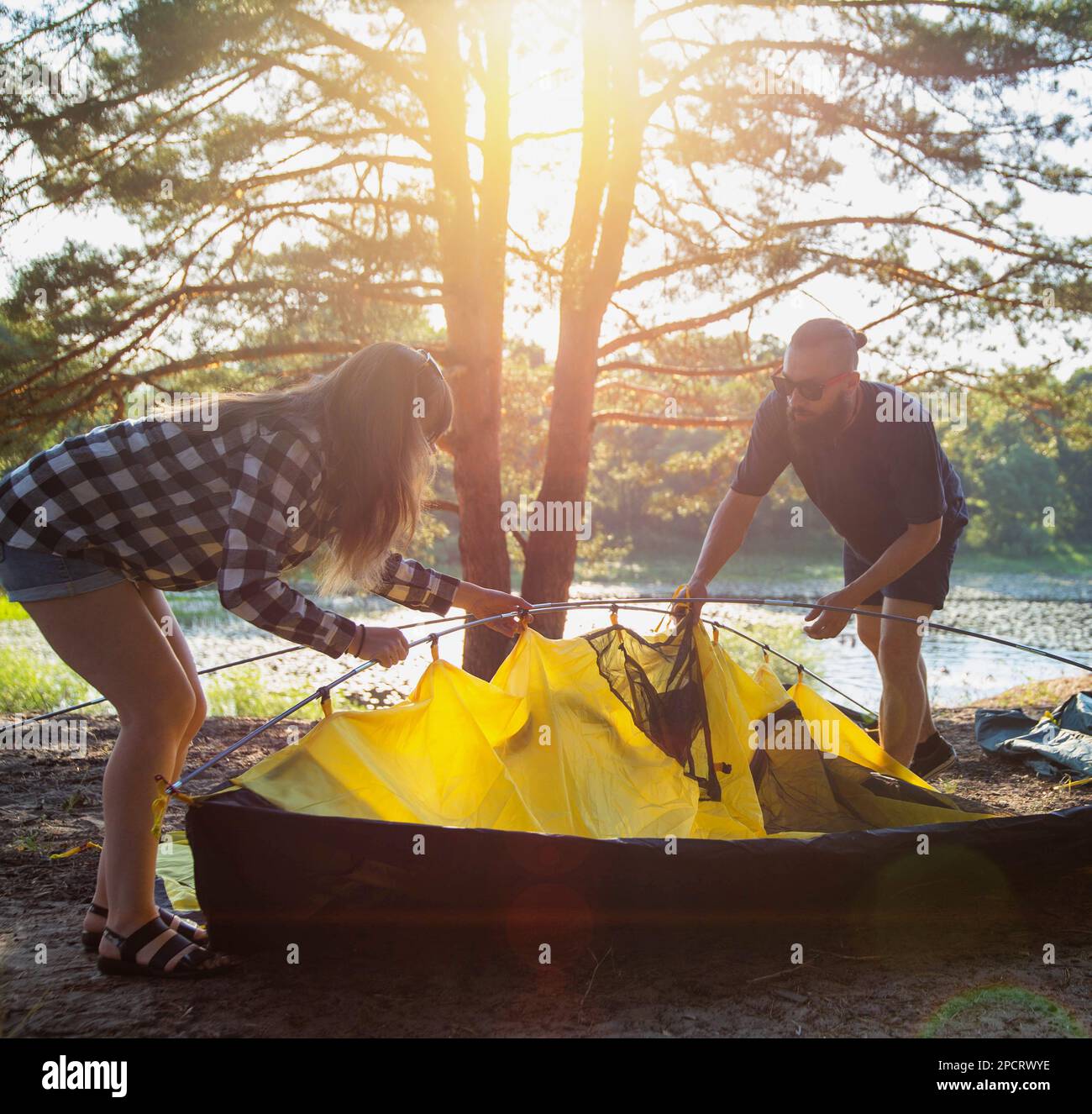 Girls setting up tent hi-res stock photography and images - Alamy