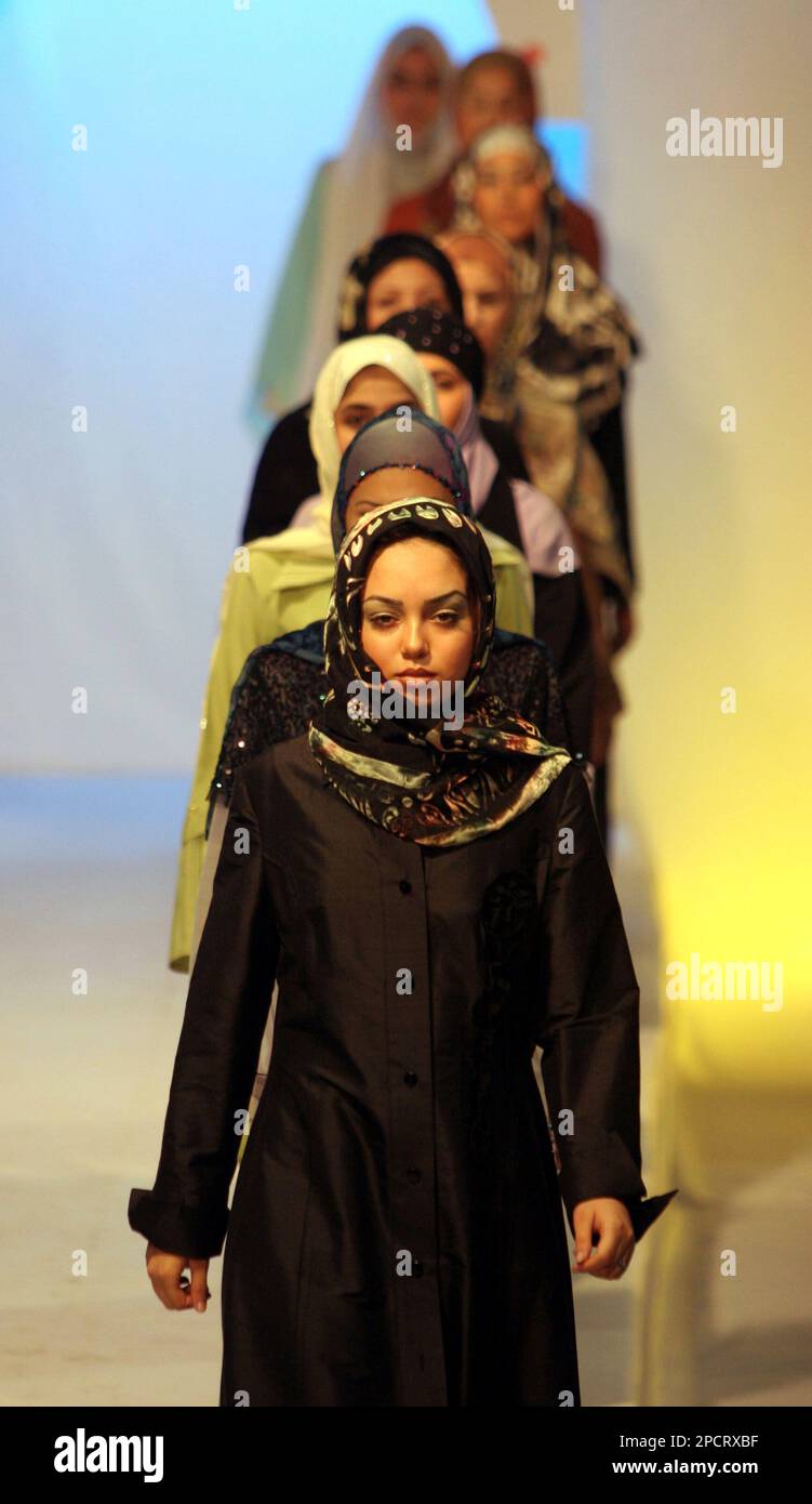 Models wear Islamic dresses created by Iranian designers at a fashion ...
