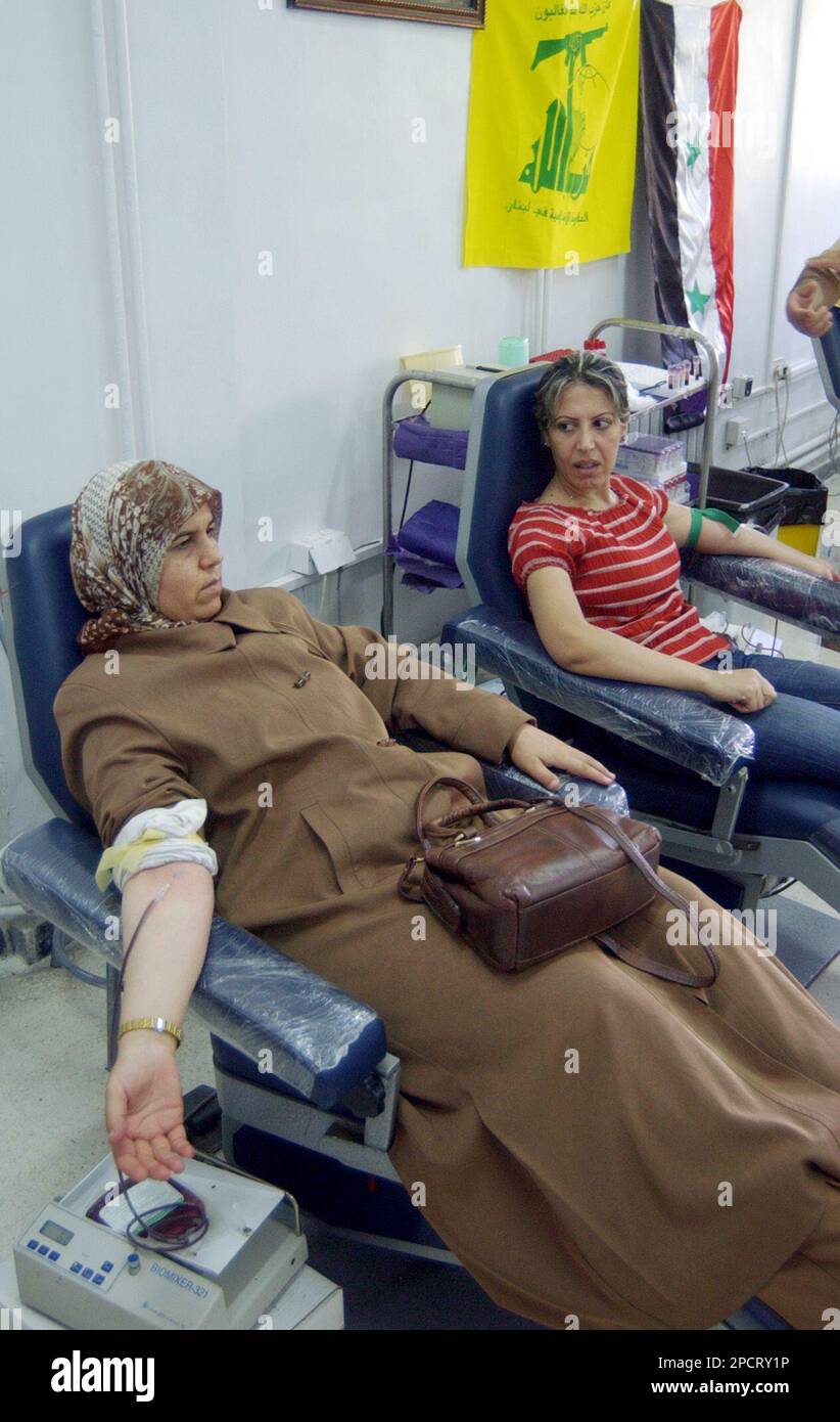 Syrians donate blood on Tuesday, July 18, 2006 in Damascus at one of ...