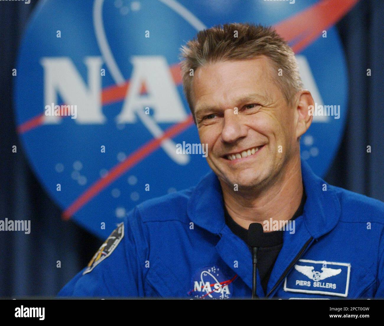 British born U.S. Astronaut Piers Sellers talks with reporters ...
