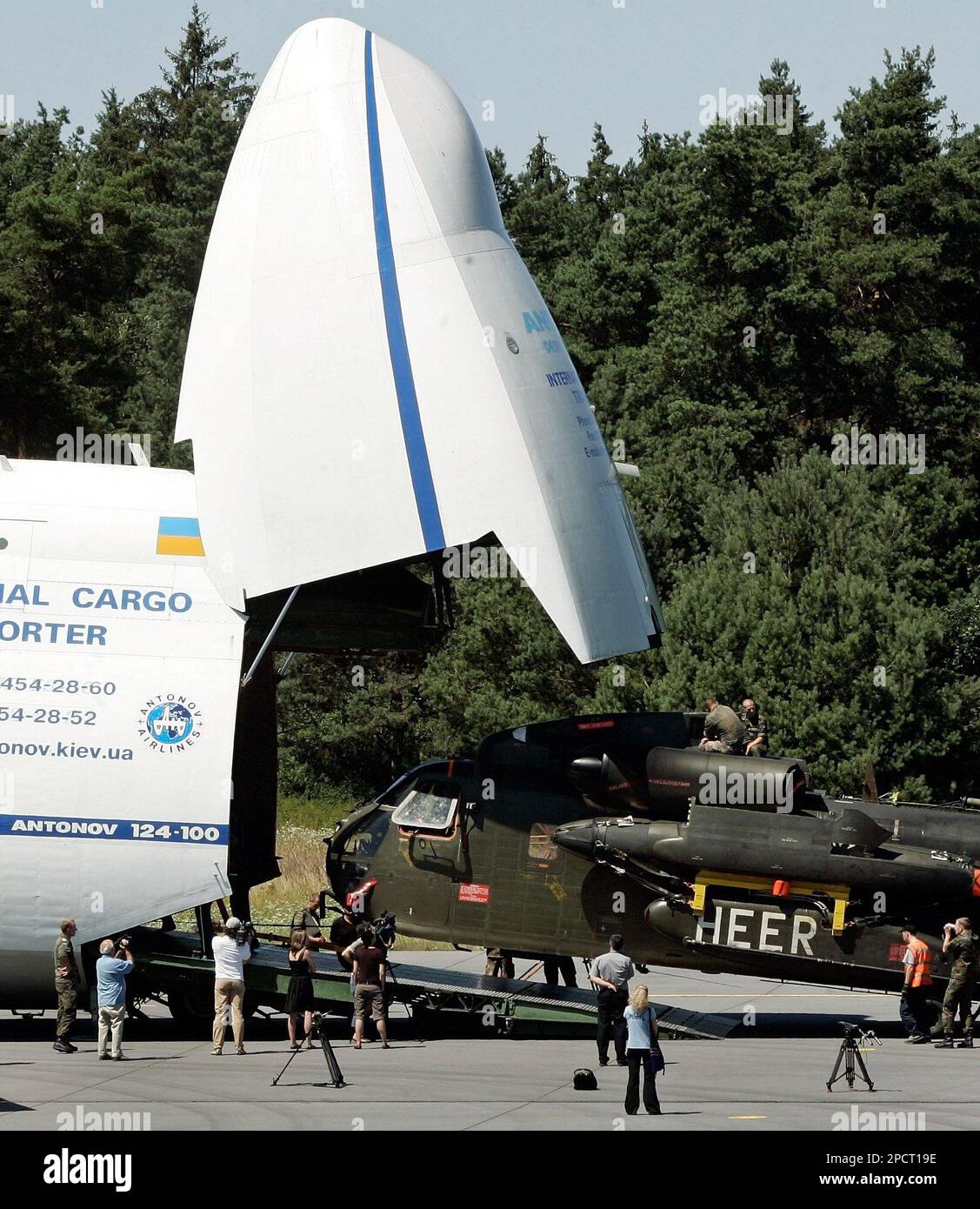A helicopter of the German army Bundeswehr is loaded in an Antonov ...