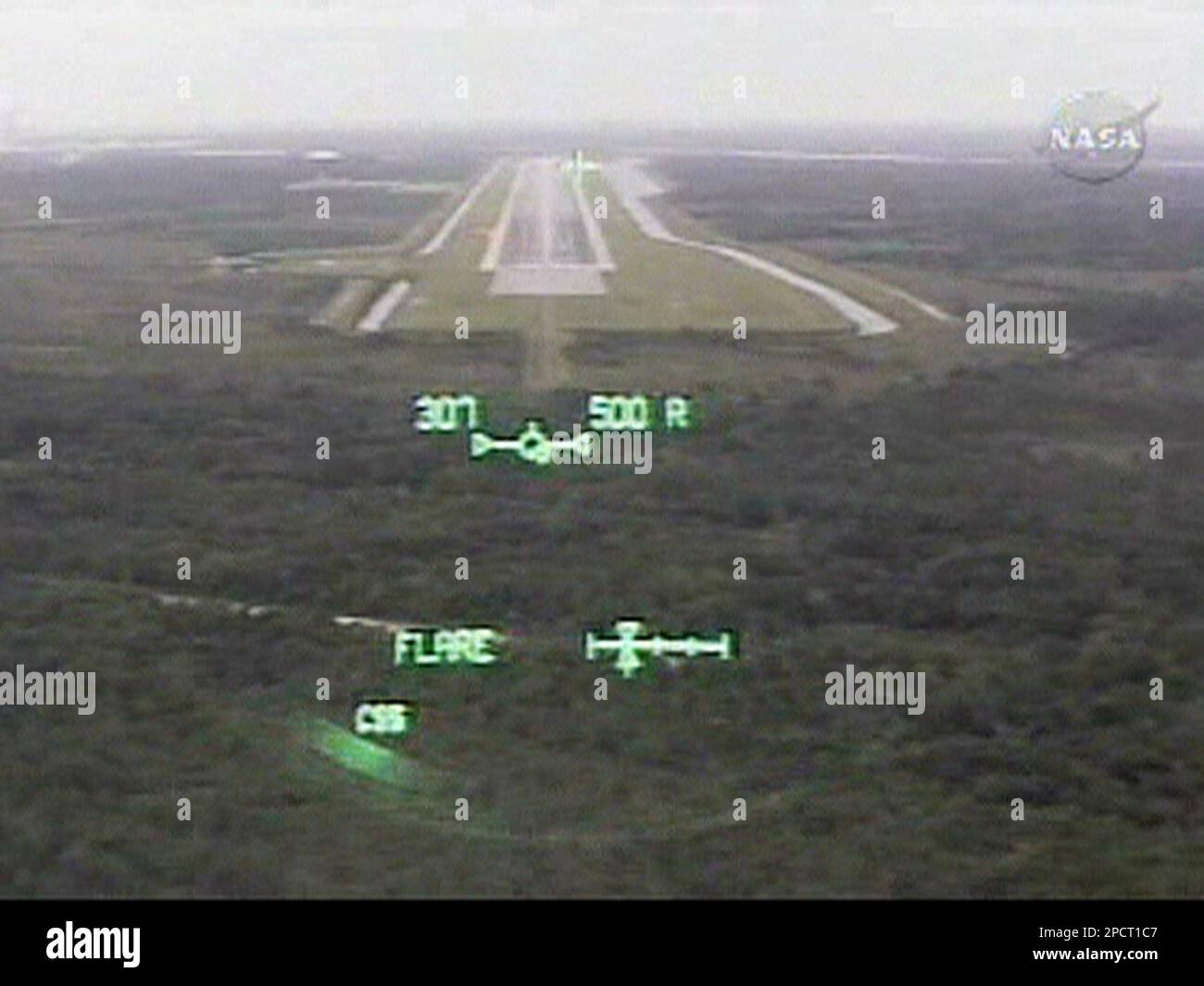This image made from NASA TV shows the runway and superimposed ...