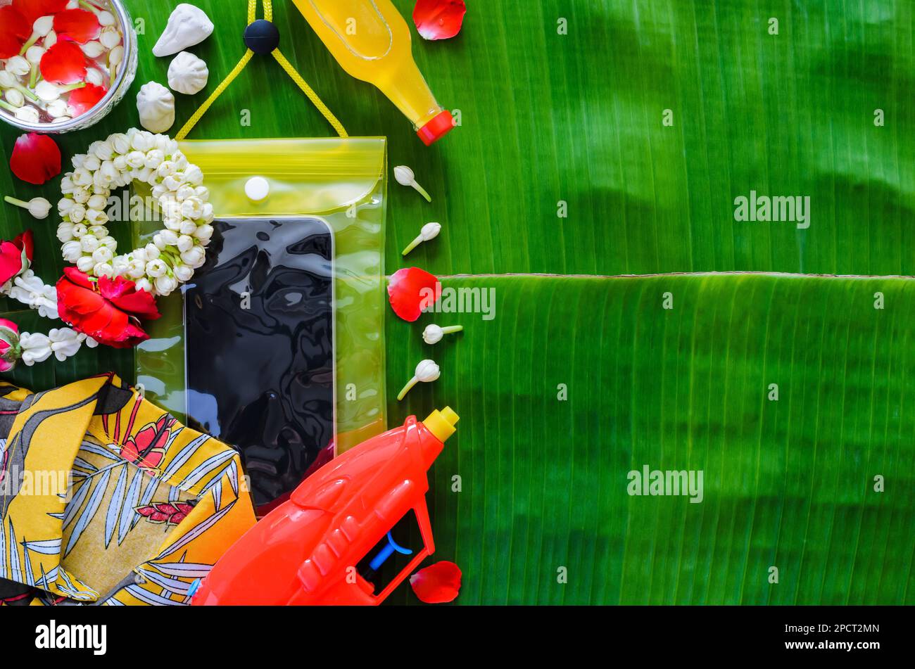 Thailand songkran festival background with smartphone in waterproof ...