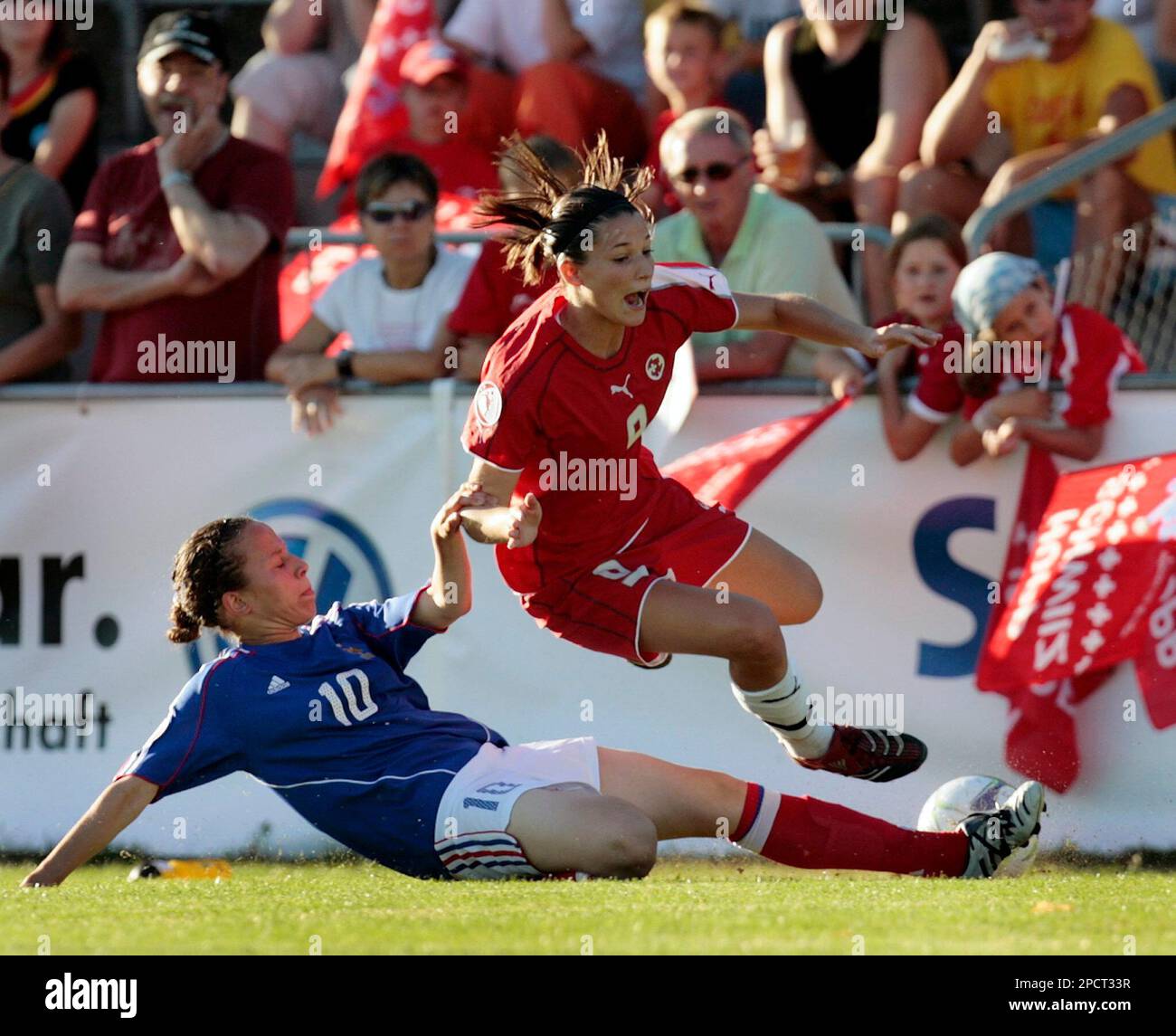 Sandy Maendly, right, from Switzerland, fights for the ball against Ines Dhaou, left, from ...