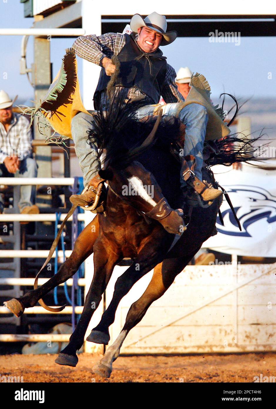 Weston Hurst of Cheyenne, Wyo., rides Rimrock in the saddle bronc ...