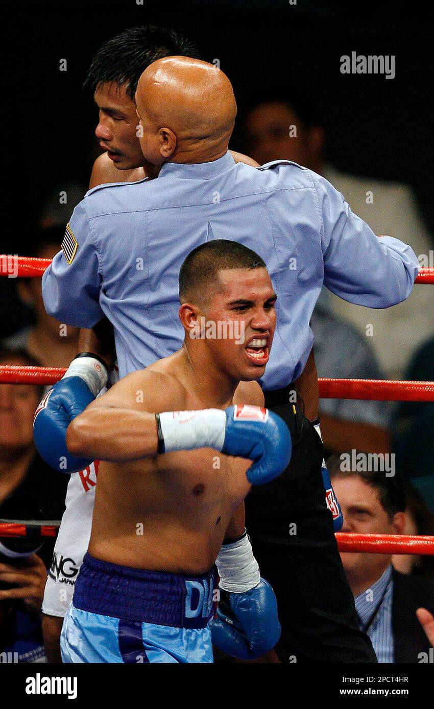 Juan Diaz of Houston celebrates his victory over Randy Suico of the ...