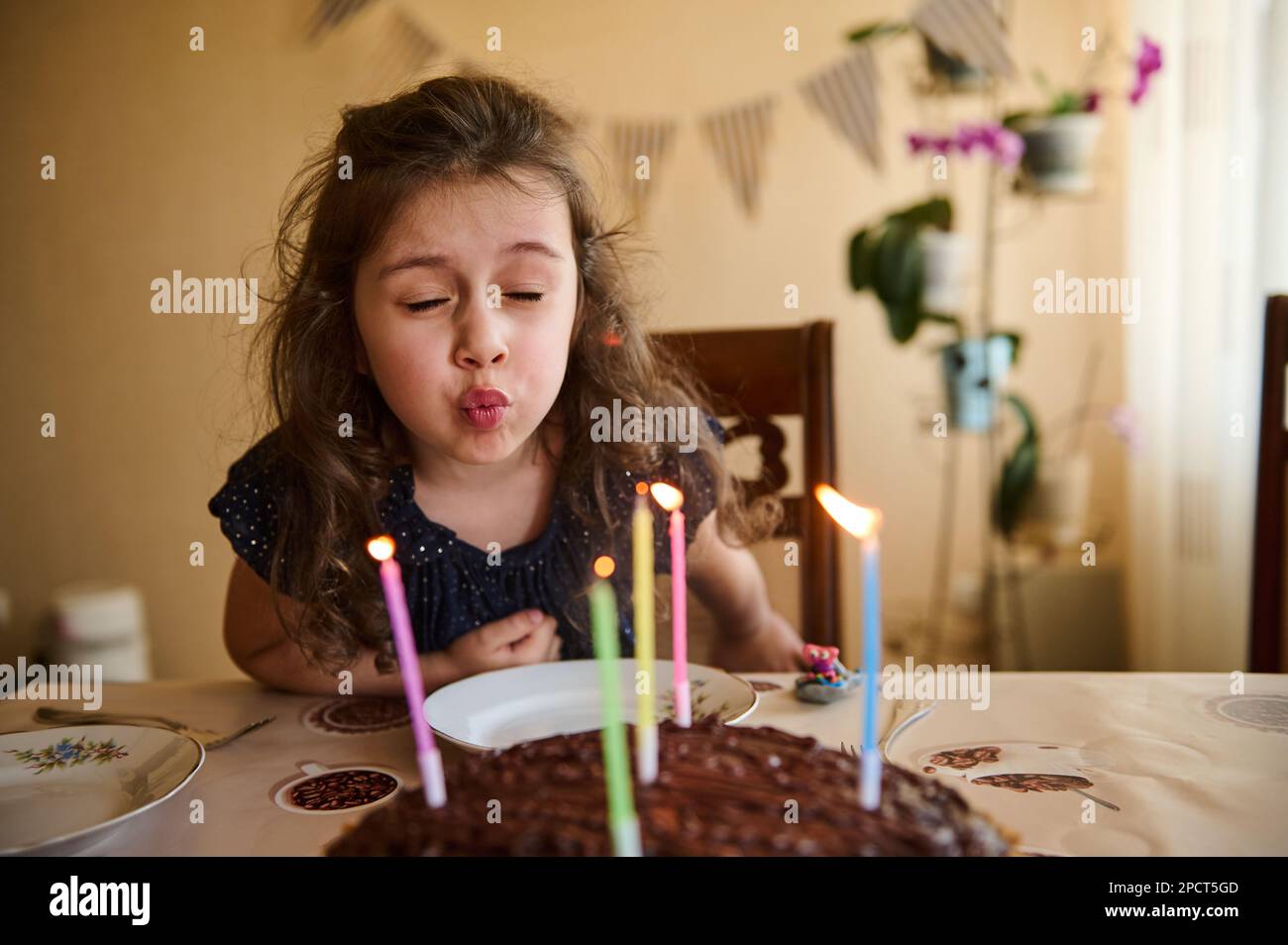Authentic portrait of a sweet baby girl making cherished wish while ...