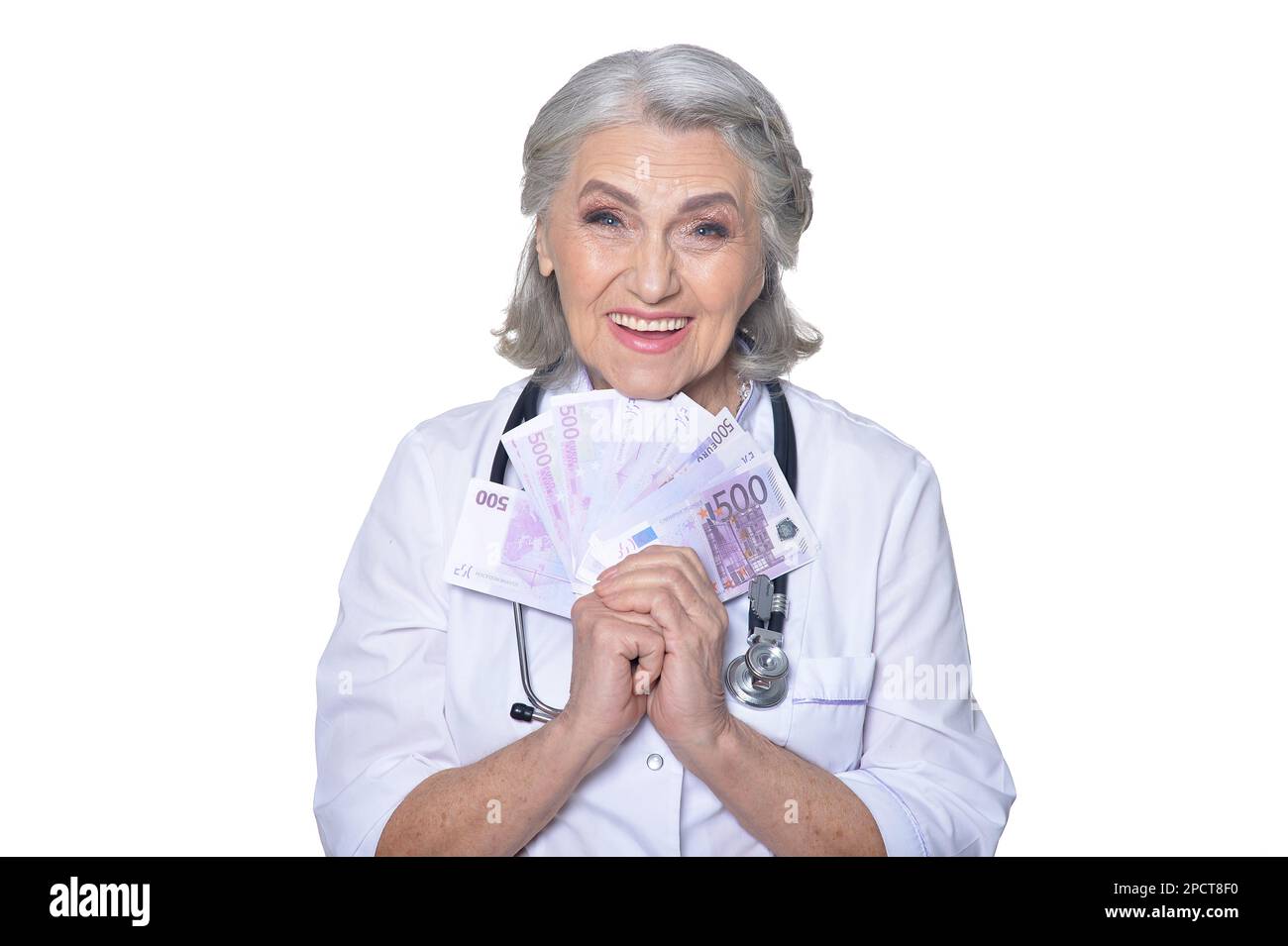 Portrait of female doctor holding money bills Stock Photo - Alamy
