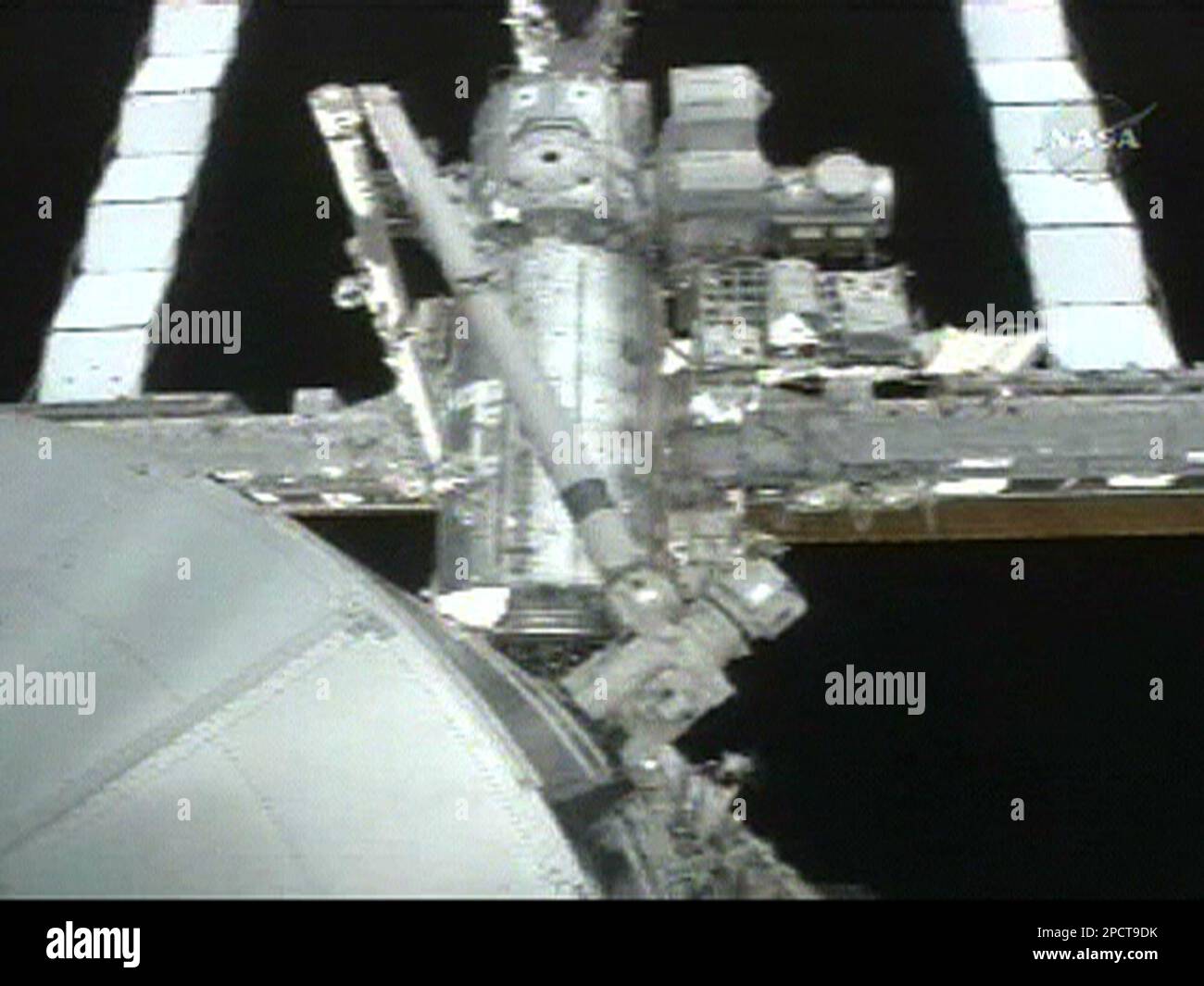 In this image made from NASA TV, the Leonardo module is tucked away in ...