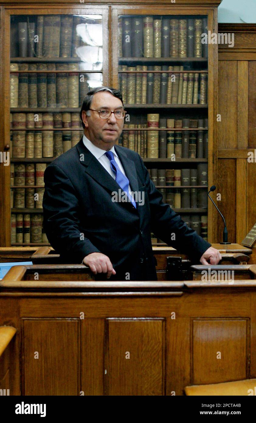 Chief Magistrate of England and Wales Timothy Workman poses by a dock ...
