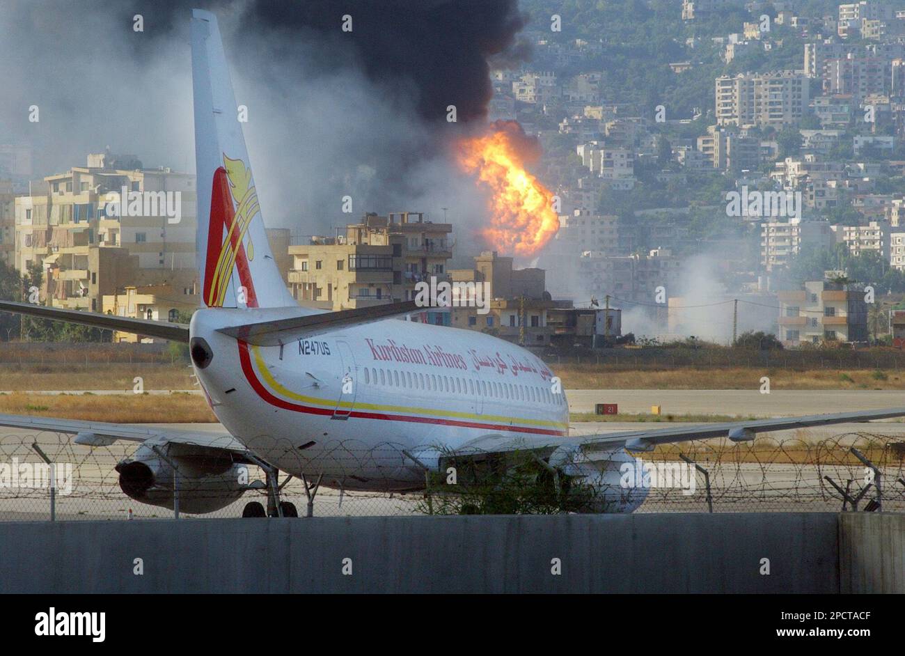 A passenger plane sits on the tarmac of Rafik Hariri International ...