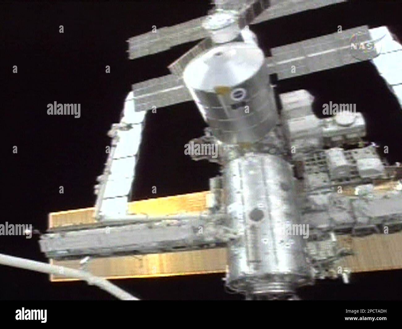 In this image made from NASA TV, shows the Leonardo module attached to ...
