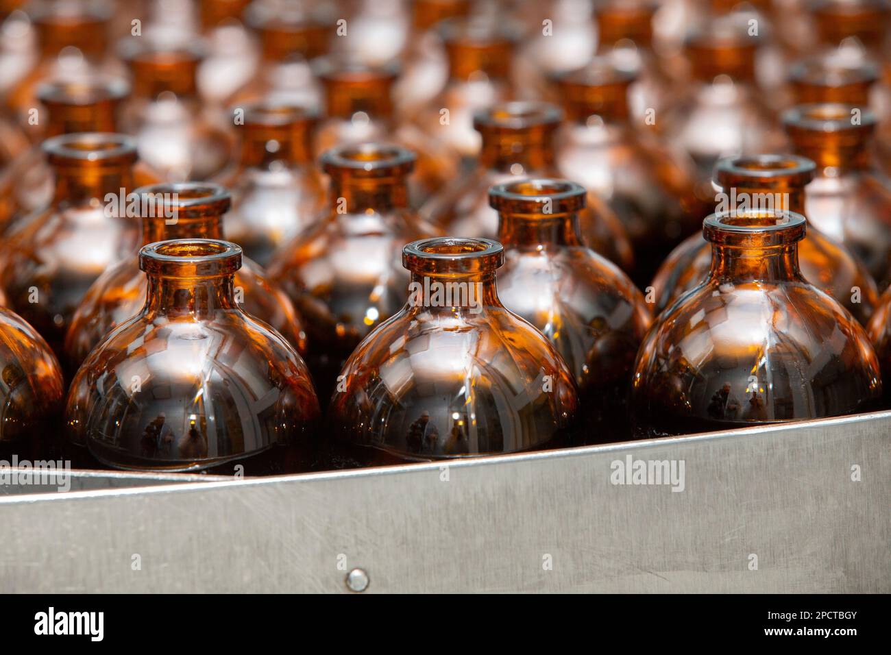 Glass bottles in a factory for the production of medical and veterinary ...