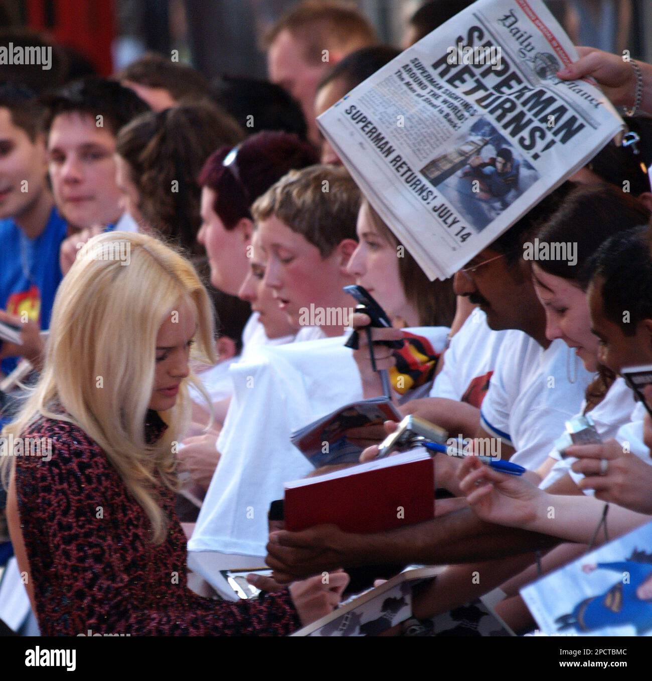 U.S. actress Kate Bosworth signs autographs as she arrives in Leicester ...