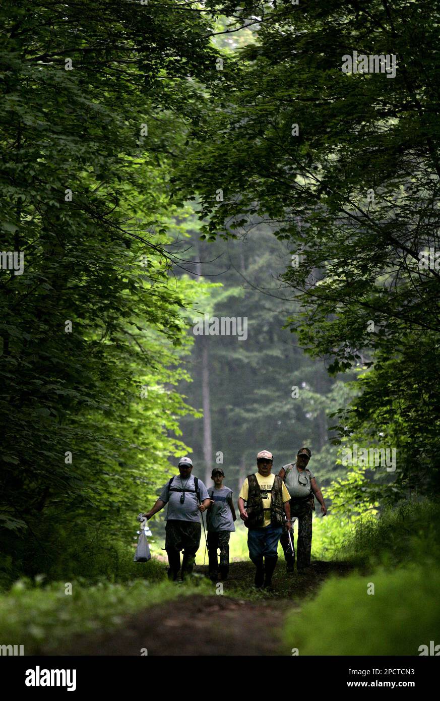 ** ADVANCE FOR SUNDAY JULY 16 ** Snake Hunters, from left, Frank ...