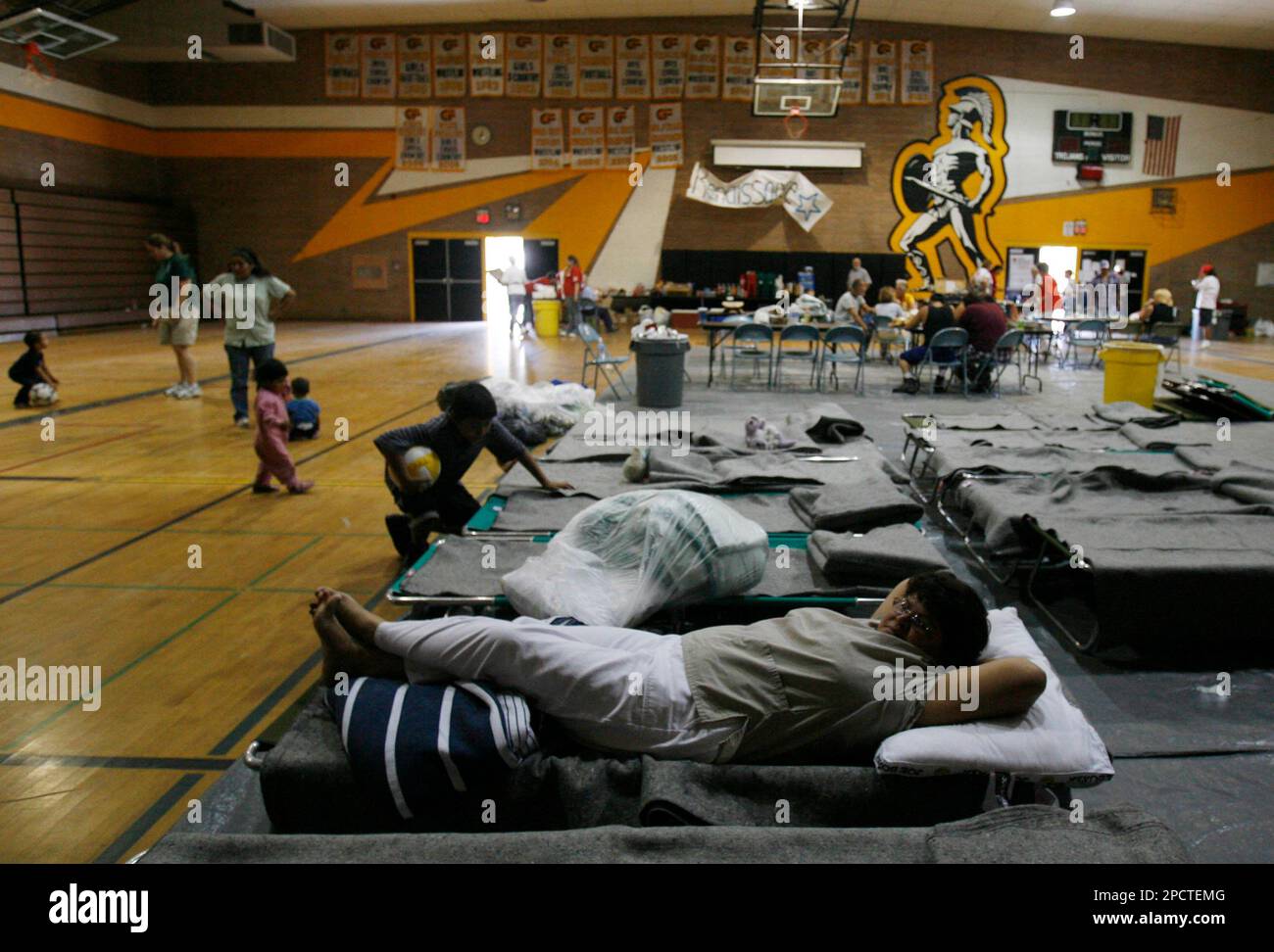 Martina Delgado rests at a Red Cross evacuation center at Yucca Valley ...