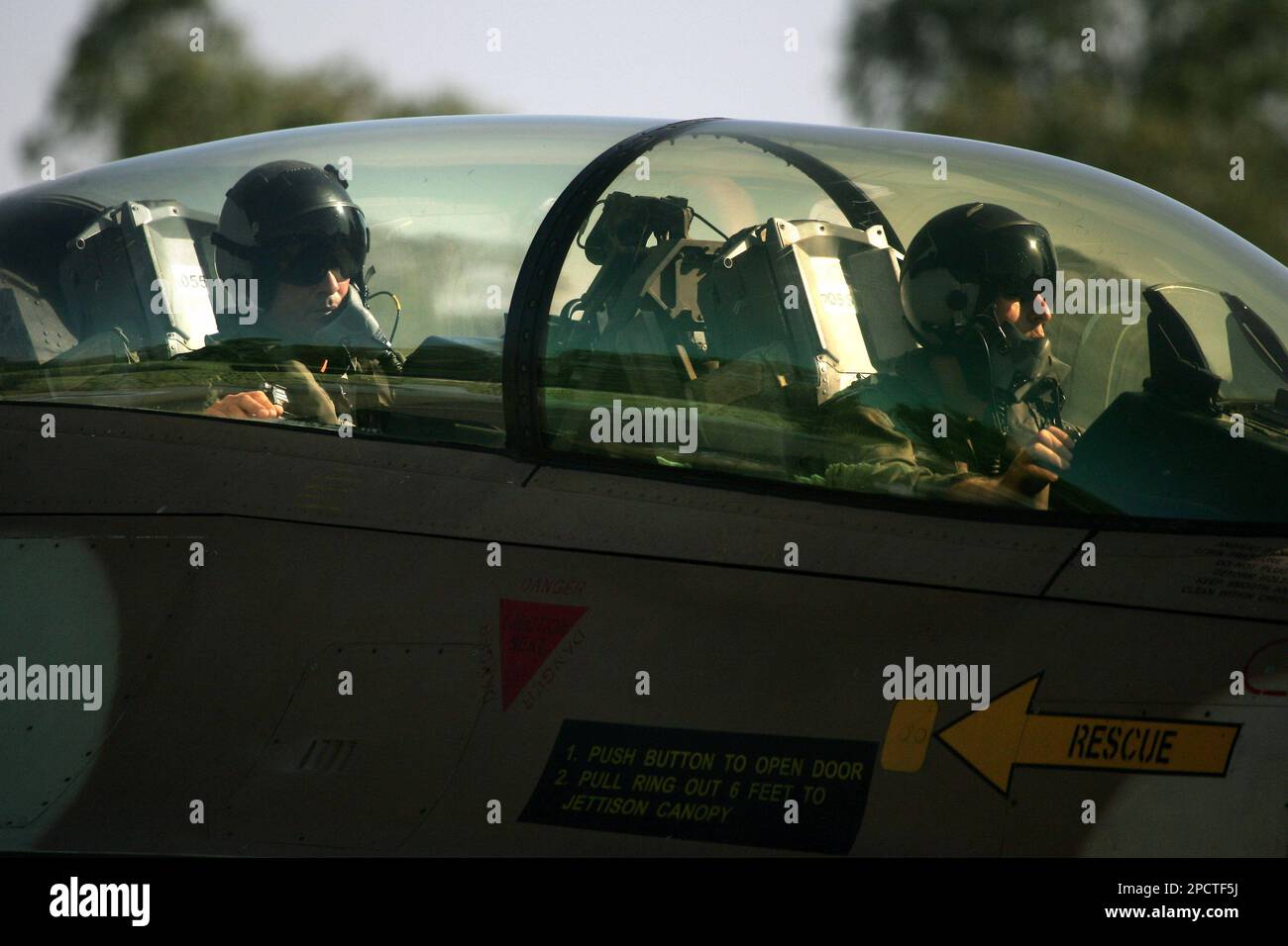 Israeli pilots, seen in the cockpit of an Israeli warplane as they ...