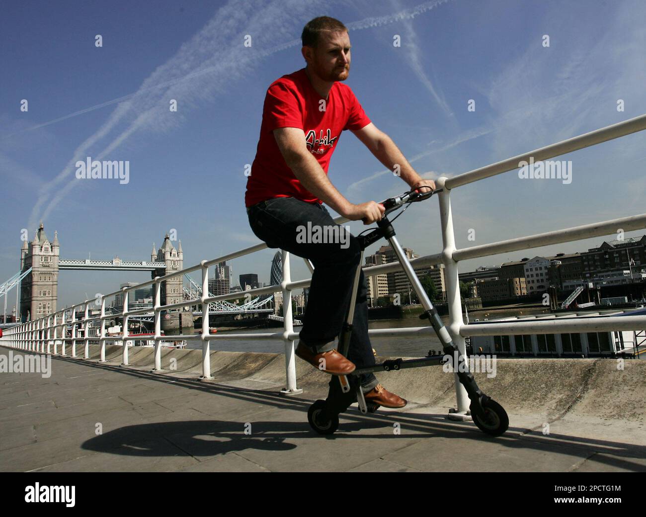 Industry Designer Ben Wilson demonstrates a folding bicycle A-bike ...
