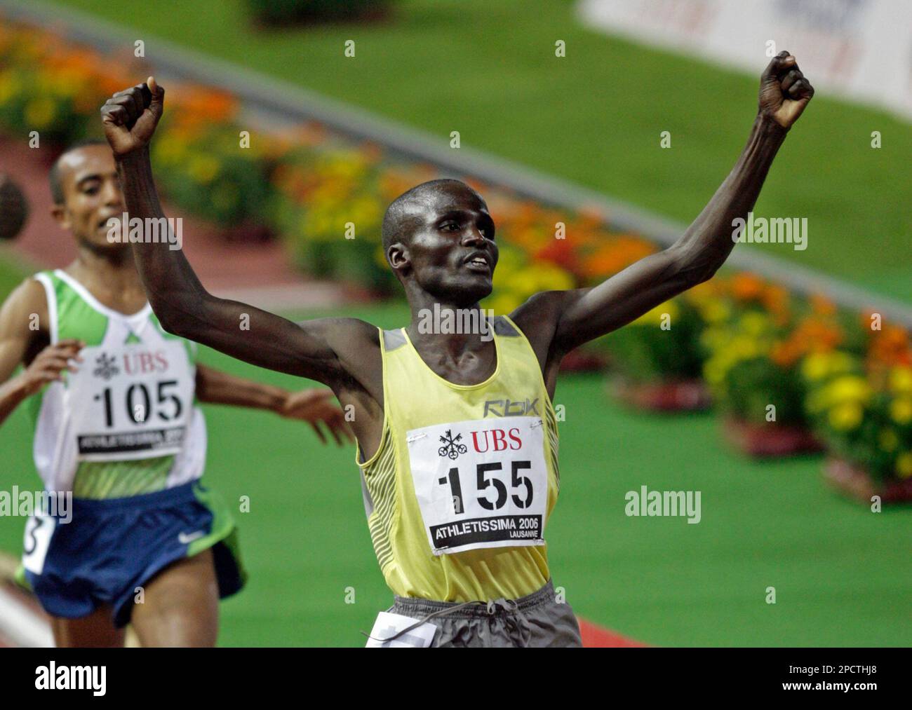 Kenyan Edwin Soi reacts after crossing the finish line of the men's ...