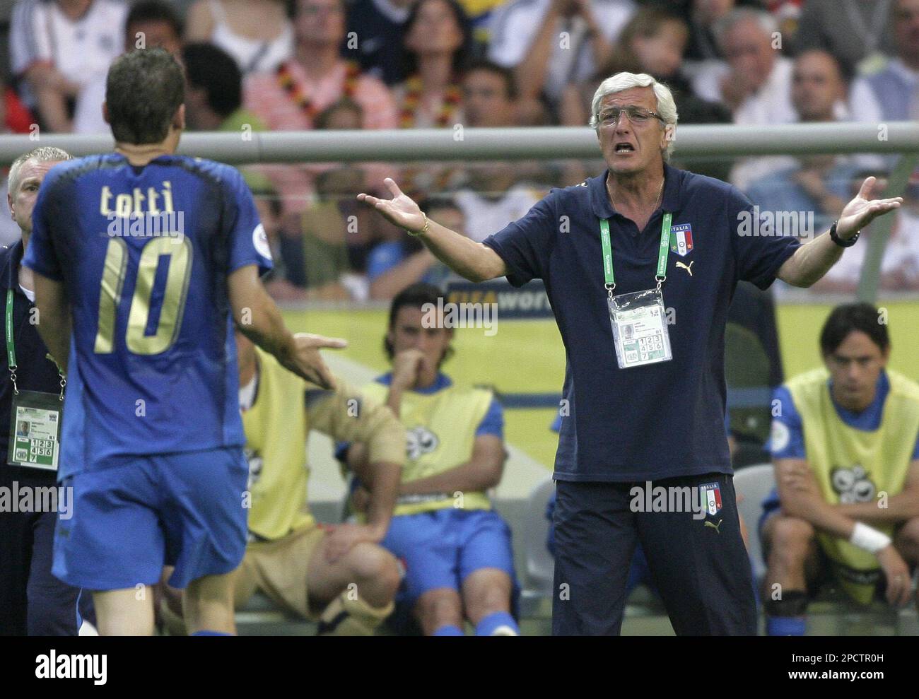 Italian coach Marcello Lippi yells toward his player Francesco Totti ...