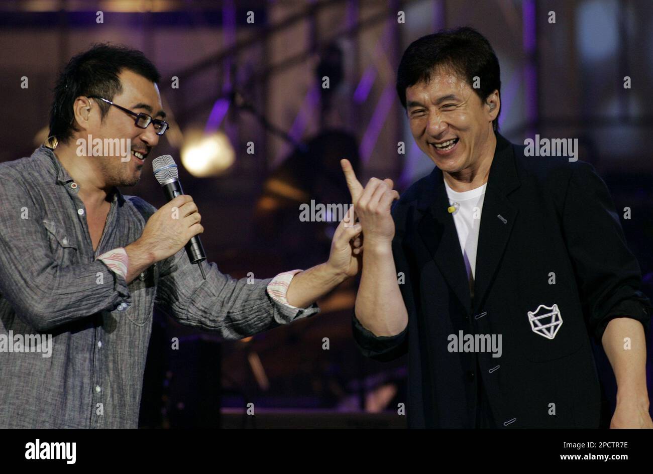 Hong Kong movie star Jackie Chan, right, plays with Taiwan composer ...