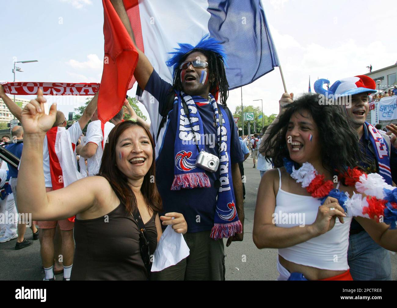 French soccer fans cheer in front of the Olympic Stadium before the ...