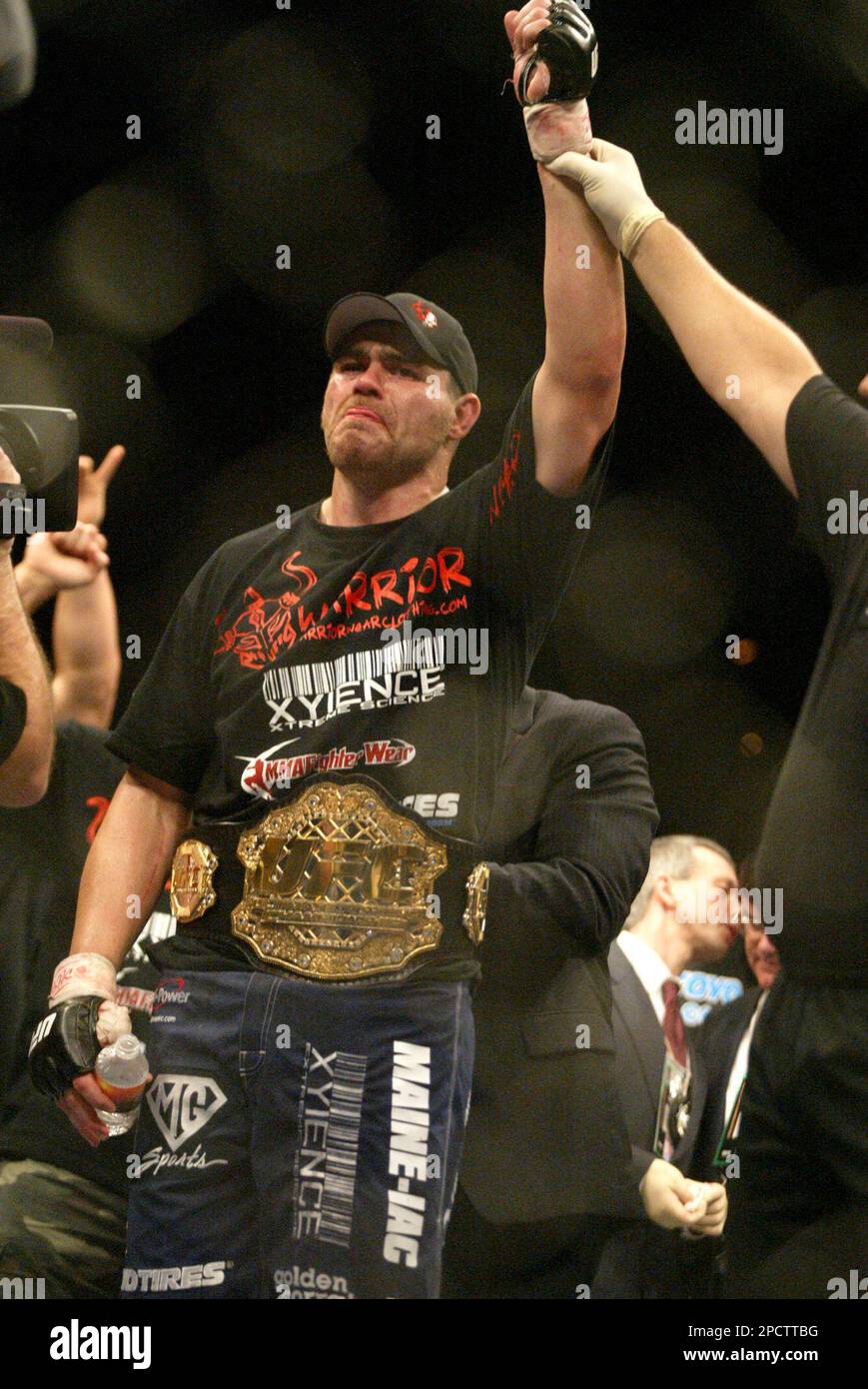Tim Sylvia celebrates after defeating Andrei Arlovski for the ...