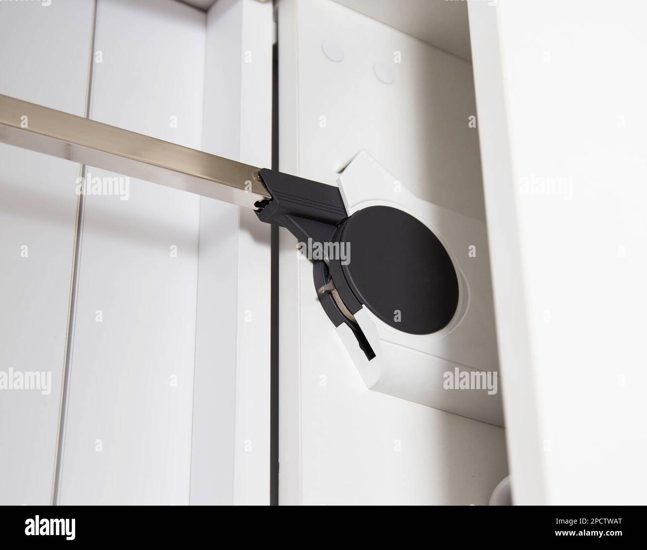 The modern lifting mechanism of a facade of a door with the closer ...