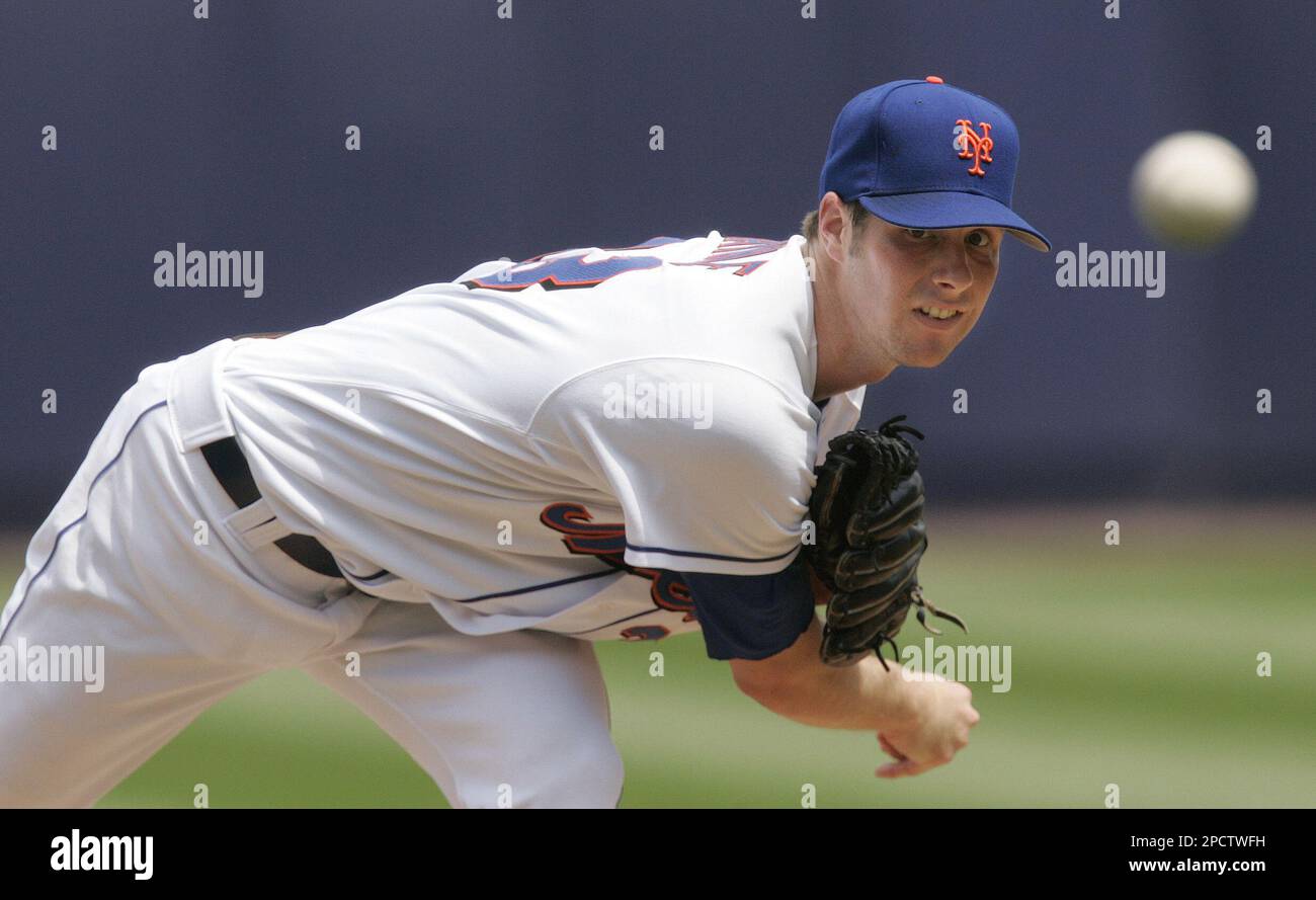 New York Mets pitcher John Maine delivers against the Florida Marlins ...