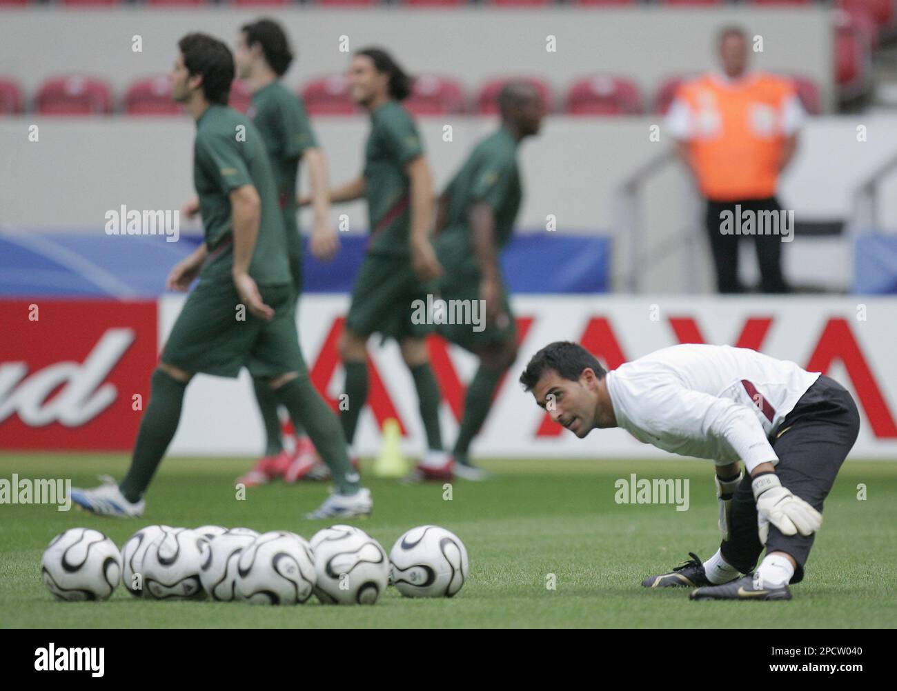 Portugal's goal keeper Ricardo stretches during a training session at ...