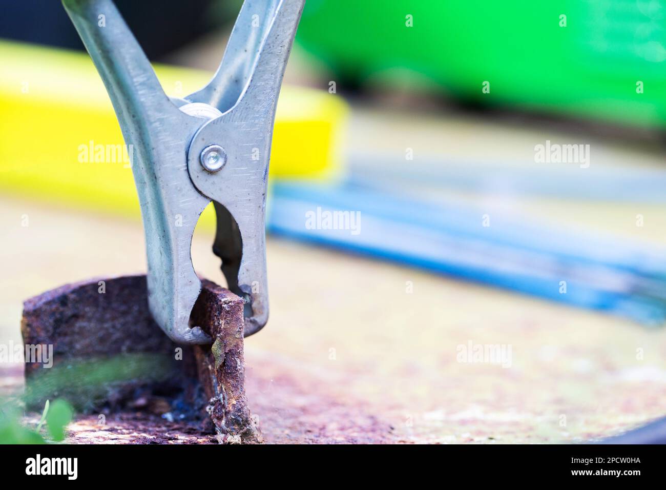 Welding terminal clamp in the welding cable for earth. Close-up ...