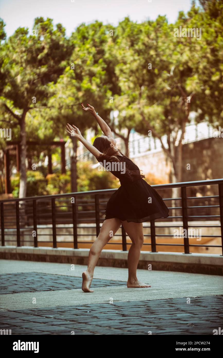 Women dancing back hi-res stock photography and images - Alamy