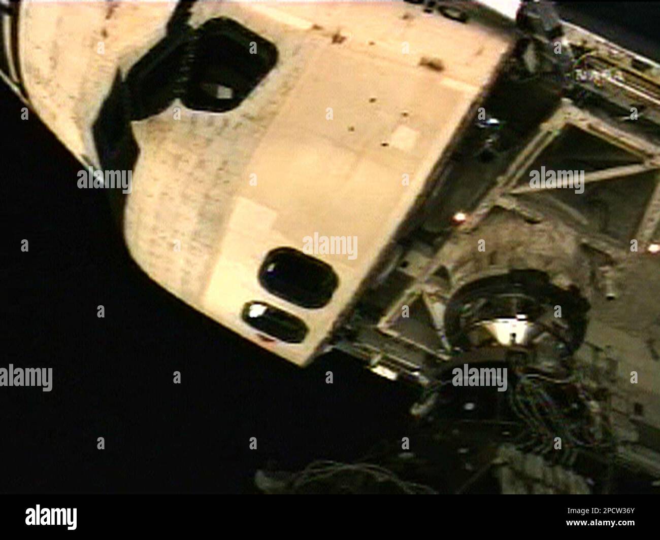 In this image made from NASA TV,the Space Shuttle Discovery's docking ...