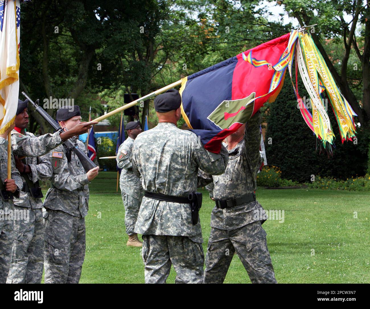 Soldiers of the U.S. Army's 1st Infantry Division case the colors ...