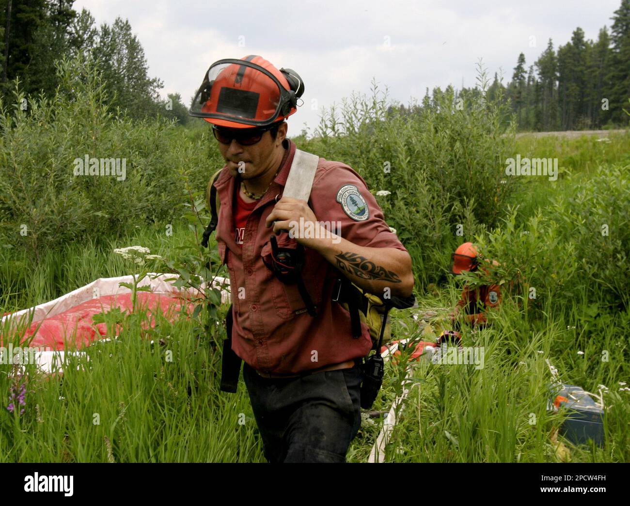 Nathan Combs, a fire fighter with the British Columbia Forest Service ...