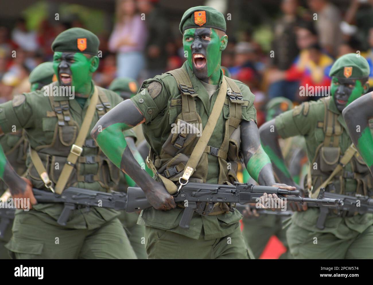 Venezuelan soldiers carrying Russian made AK-103 assault rifles march ...
