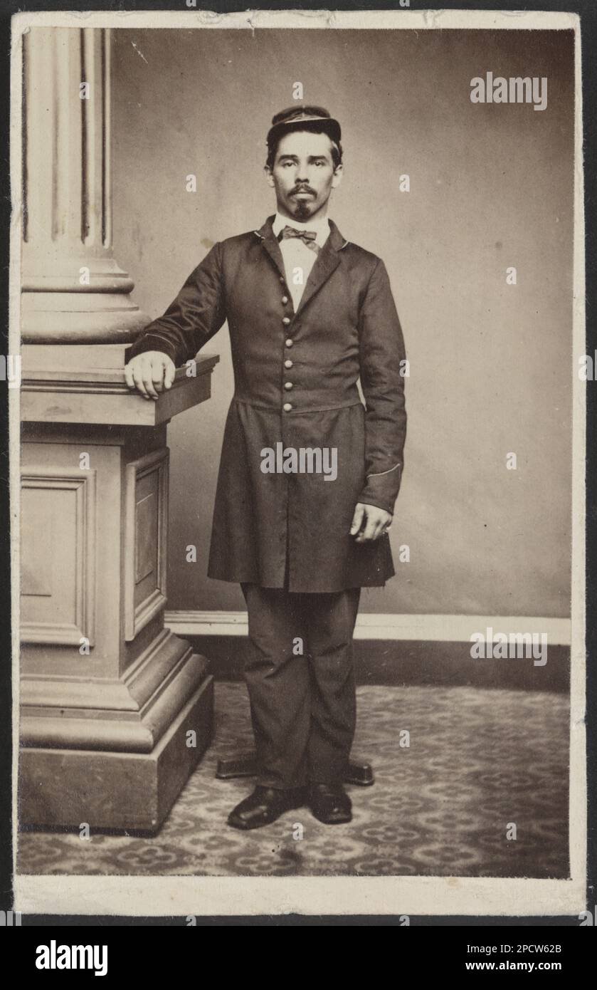 Soldier named Garrison in uniform next to column. Title devised by ...