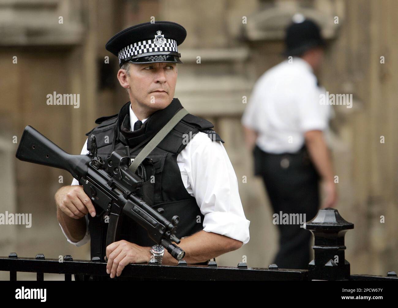 A British police officer stands guard outside the Houses of Parliament ...