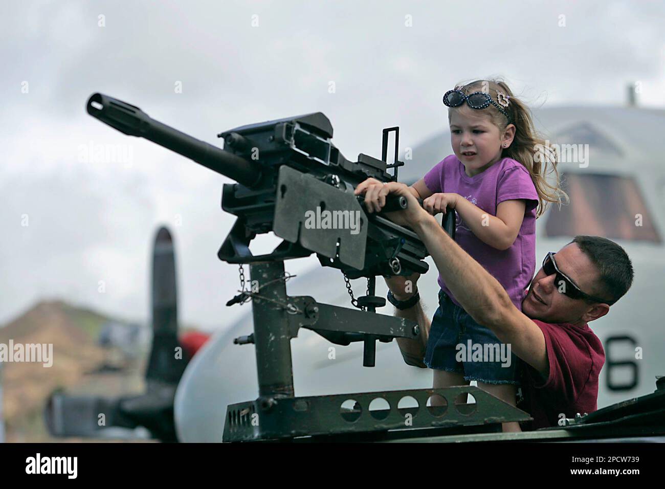 Fallon Donaldson, left, and her father Christopher Fallon, play with an ...