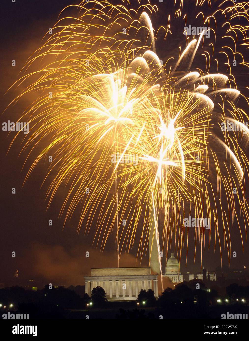Fourth of July fireworks are seen above, from left to right, The ...