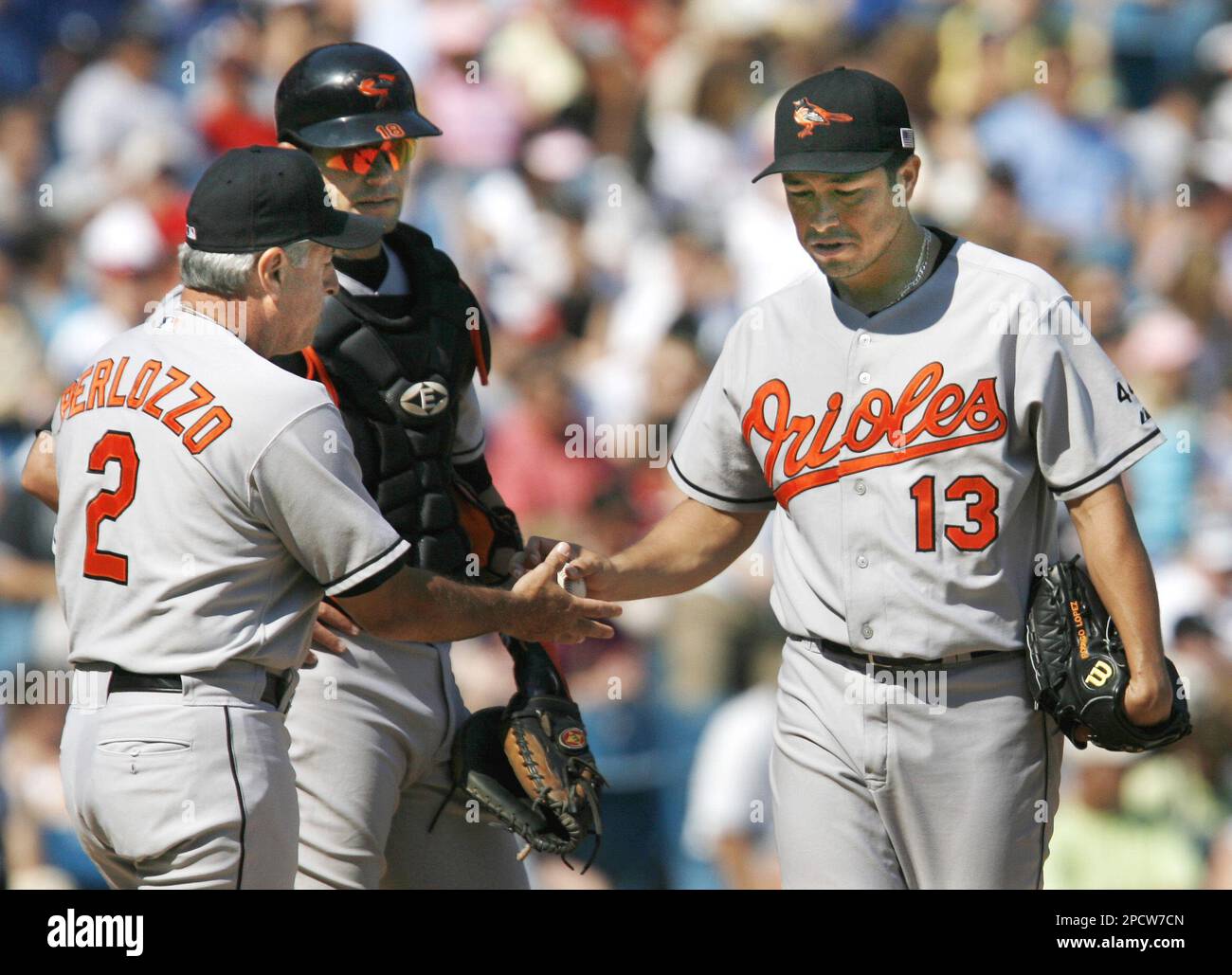 Baltimore Orioles manager Sam Perlozzo pulls pitcher Rodrigo Lopez as ...